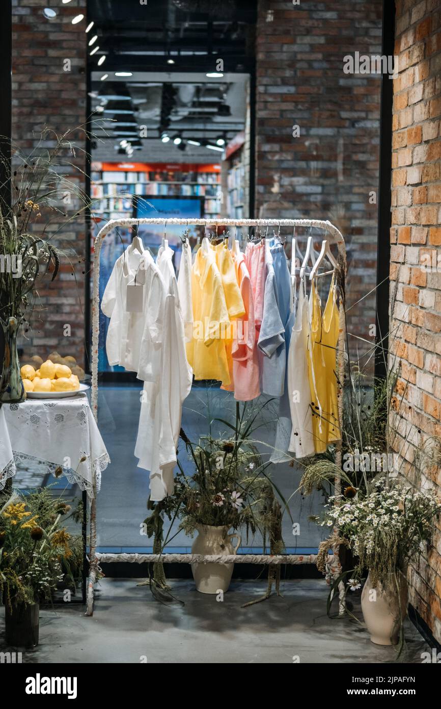 Sustainable fashion, slow fashion. Close Up Shot of Clothing Rack with ...