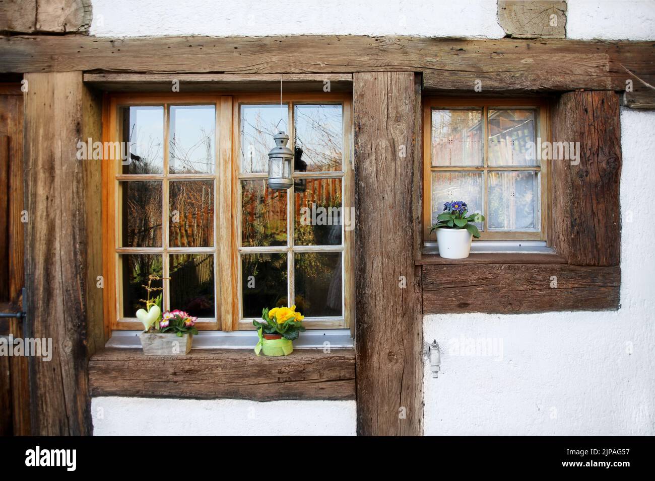 Rustic wood windows on a farm house in alps region Stock Photo - Alamy