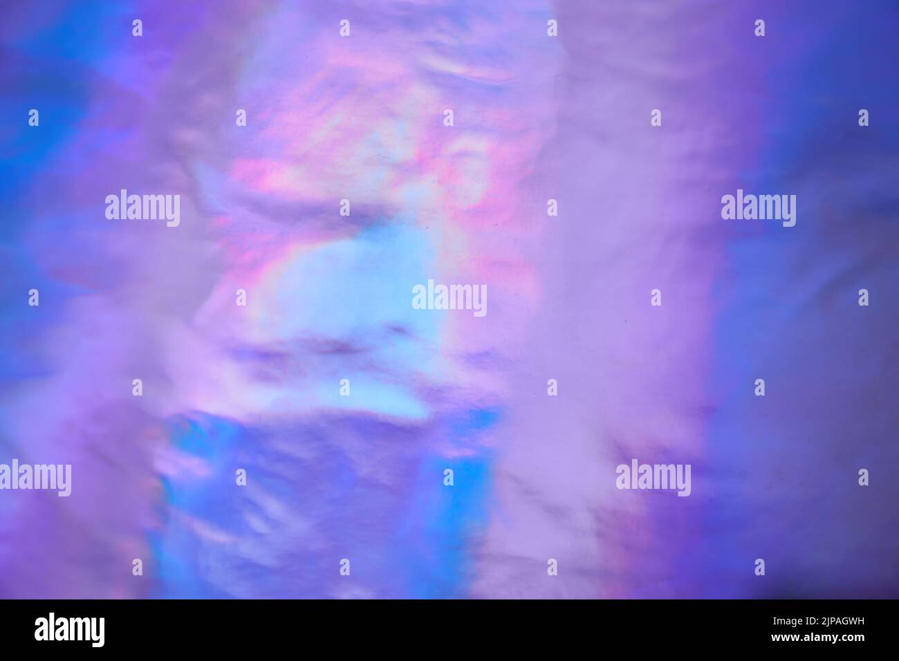 Blurred highlights on the gradient texture of the blue foil ...