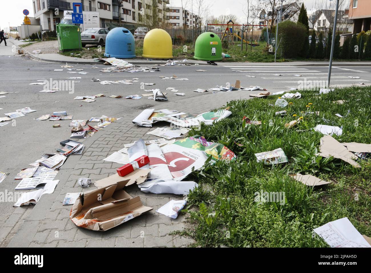 Garbage scattered on the street in the Kliny estate in Krakow, Poland ...