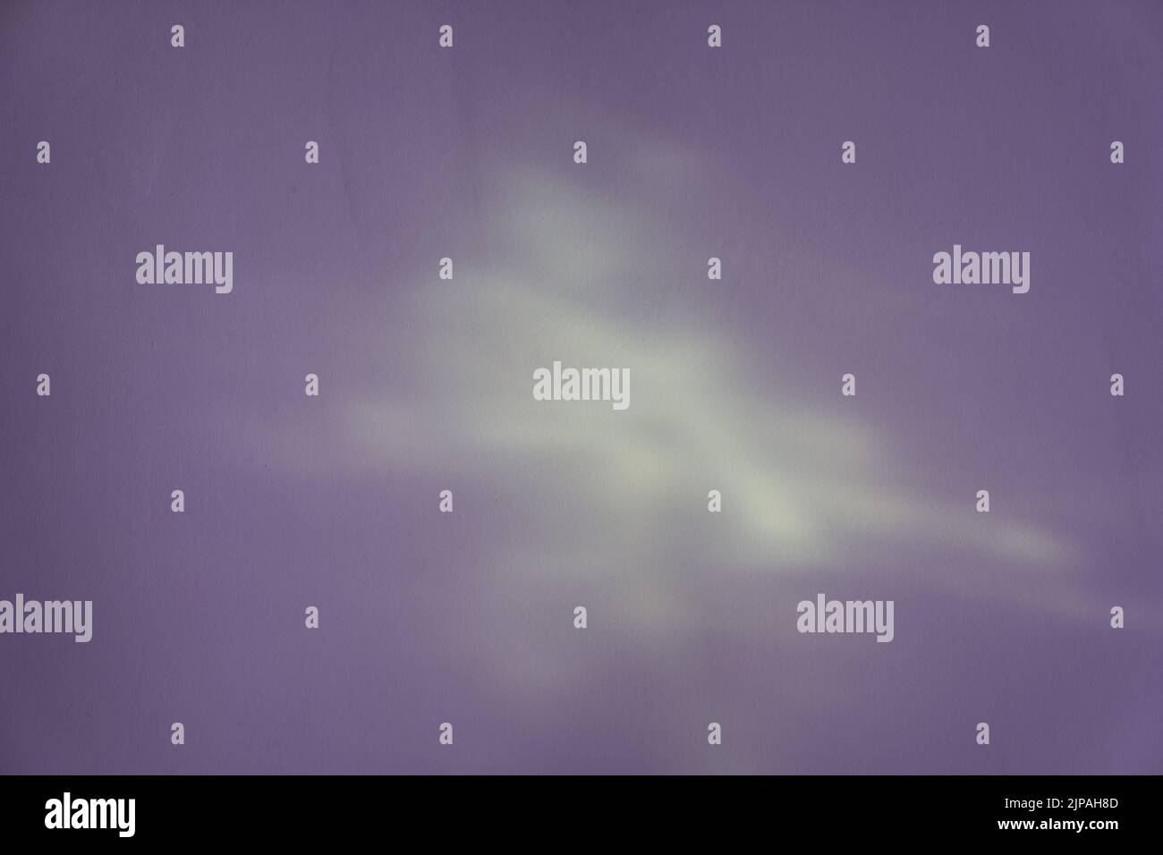 The blurred glare from the foil on the texture of the paper. Abstract ...