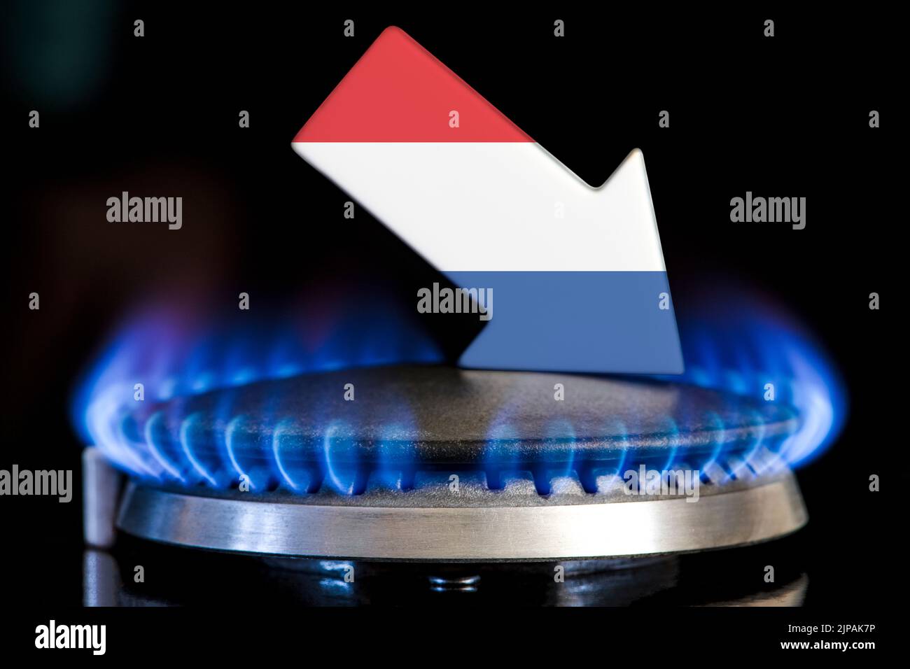 Decreased gas supplies in Netherlands. A gas stove with a burning flame ...