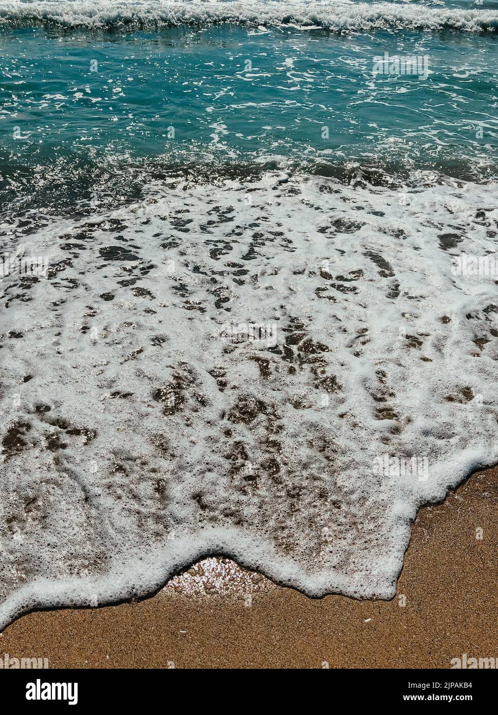 Sea blue aquamarine waves line sunny sand beach. Soft wave of ocean ...