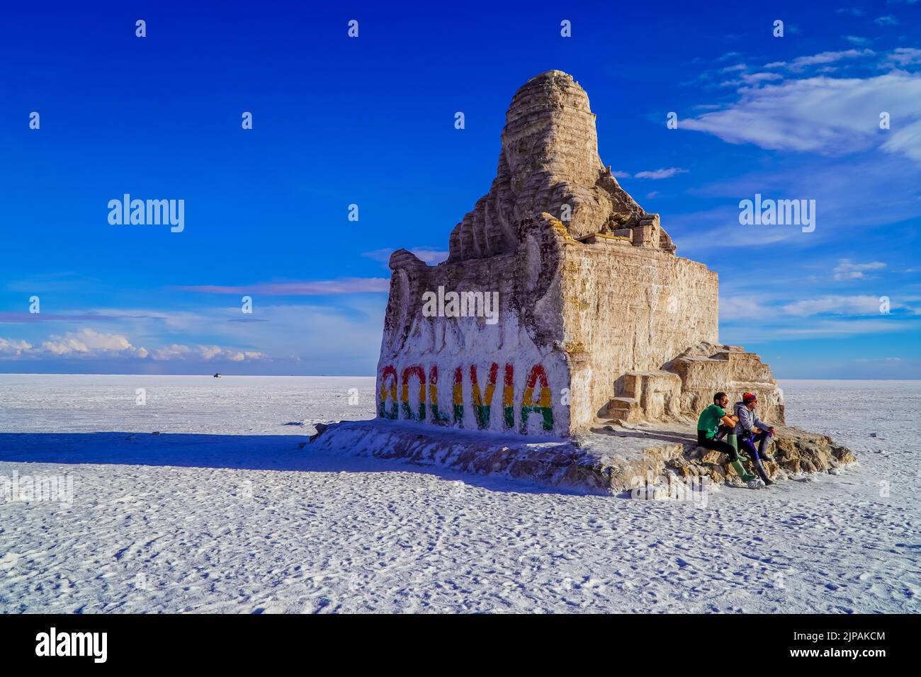 A scenic shot of the Bolivian Salt monument at Uyuni Salt Flat with a ...