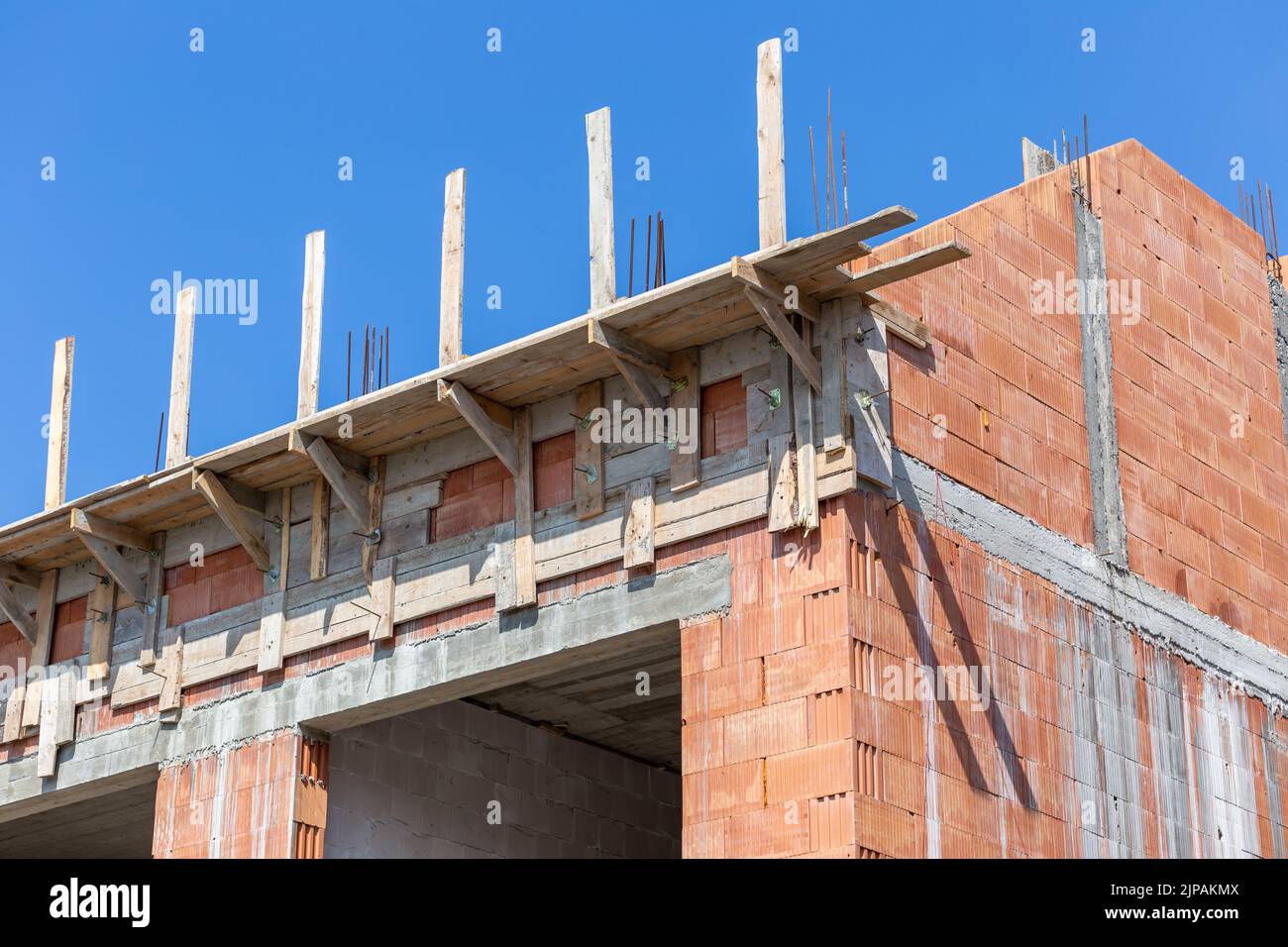 Building a home, house under construction, assembled wooden formwork ...
