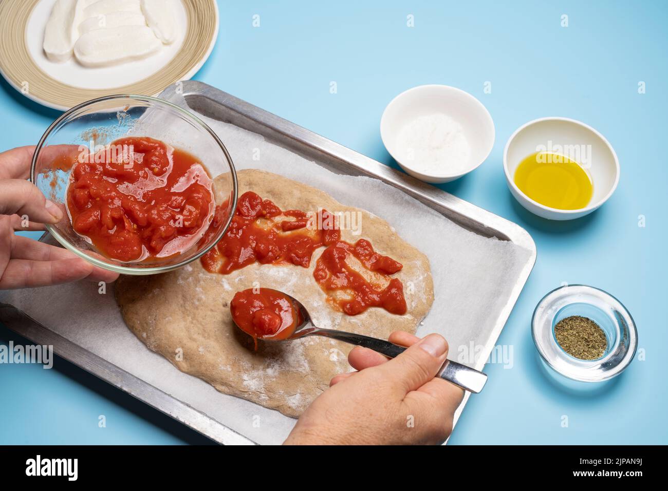 Preparing pizza in the home kitchen (steps 1 to 14). step 9: put the ...