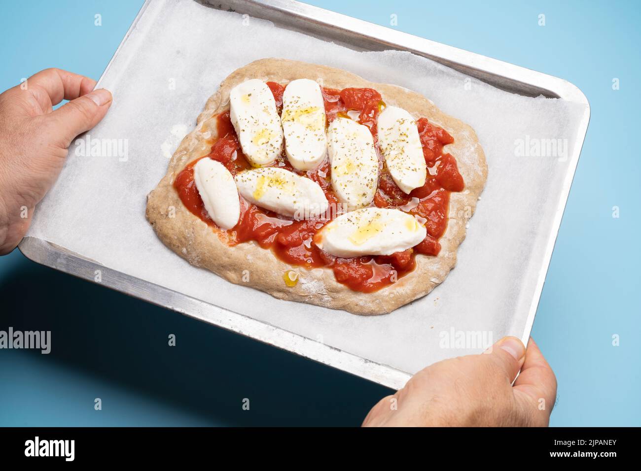 Preparing pizza in the home kitchen (steps 1 to 14). step 13: the pizza ...