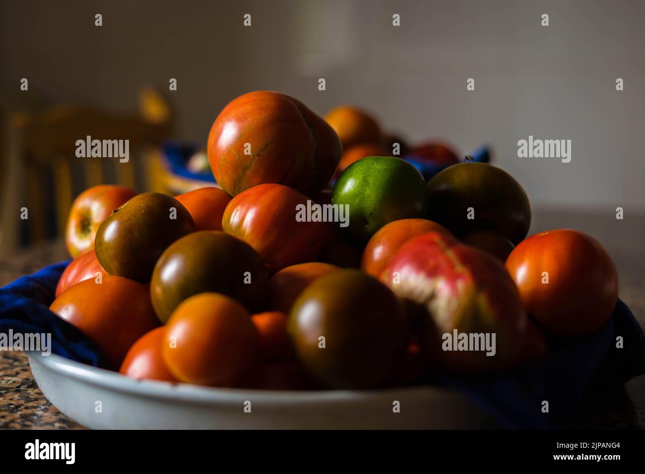 container with tomatoes Stock Photo - Alamy