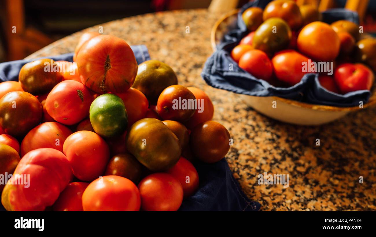 container with tomatoes Stock Photo - Alamy