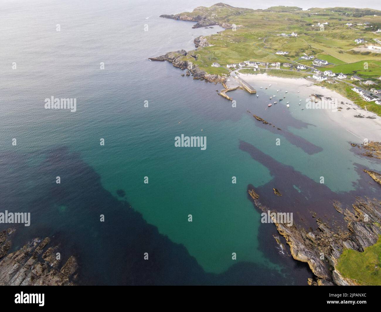 A beautiful aerial view of the Portnablagh Pier in Dunfanaghy Donegal ...