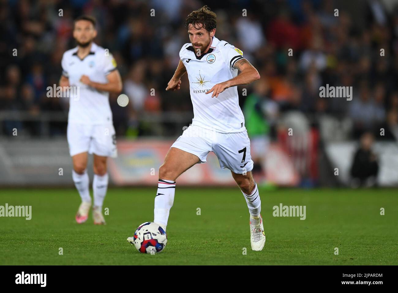Joe Allen #7 of Swansea City in action during the game Stock Photo - Alamy