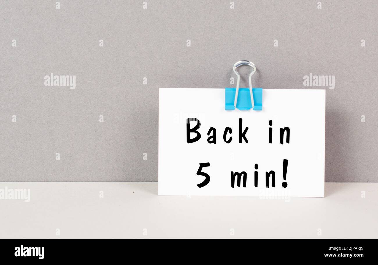 Back in 5 min is standing on a paper, take a break, be right back Stock ...