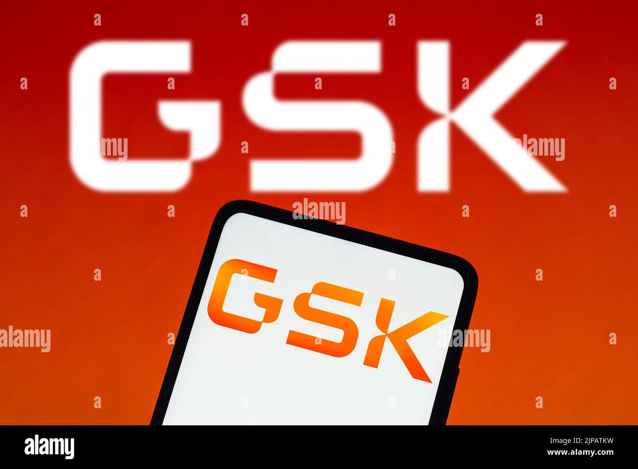 In this photo illustration, the GlaxoSmithKline (GSK) logo is displayed ...