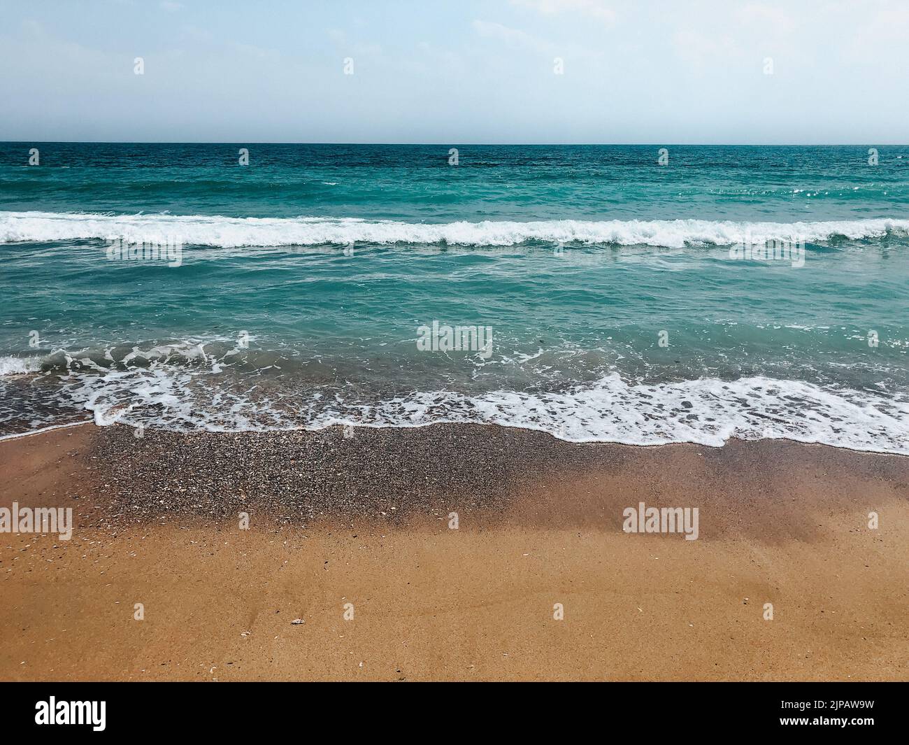 Sea blue aquamarine waves line sunny sand beach. Soft wave of ocean ...