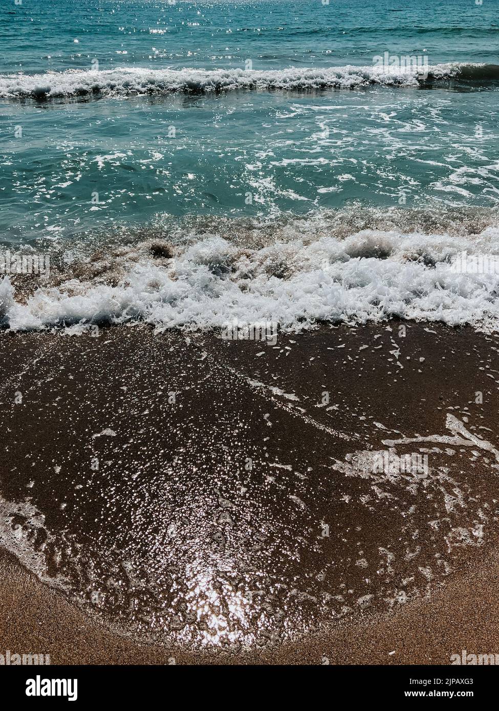 Sea blue aquamarine waves line sunny sand beach. Soft wave of ocean ...