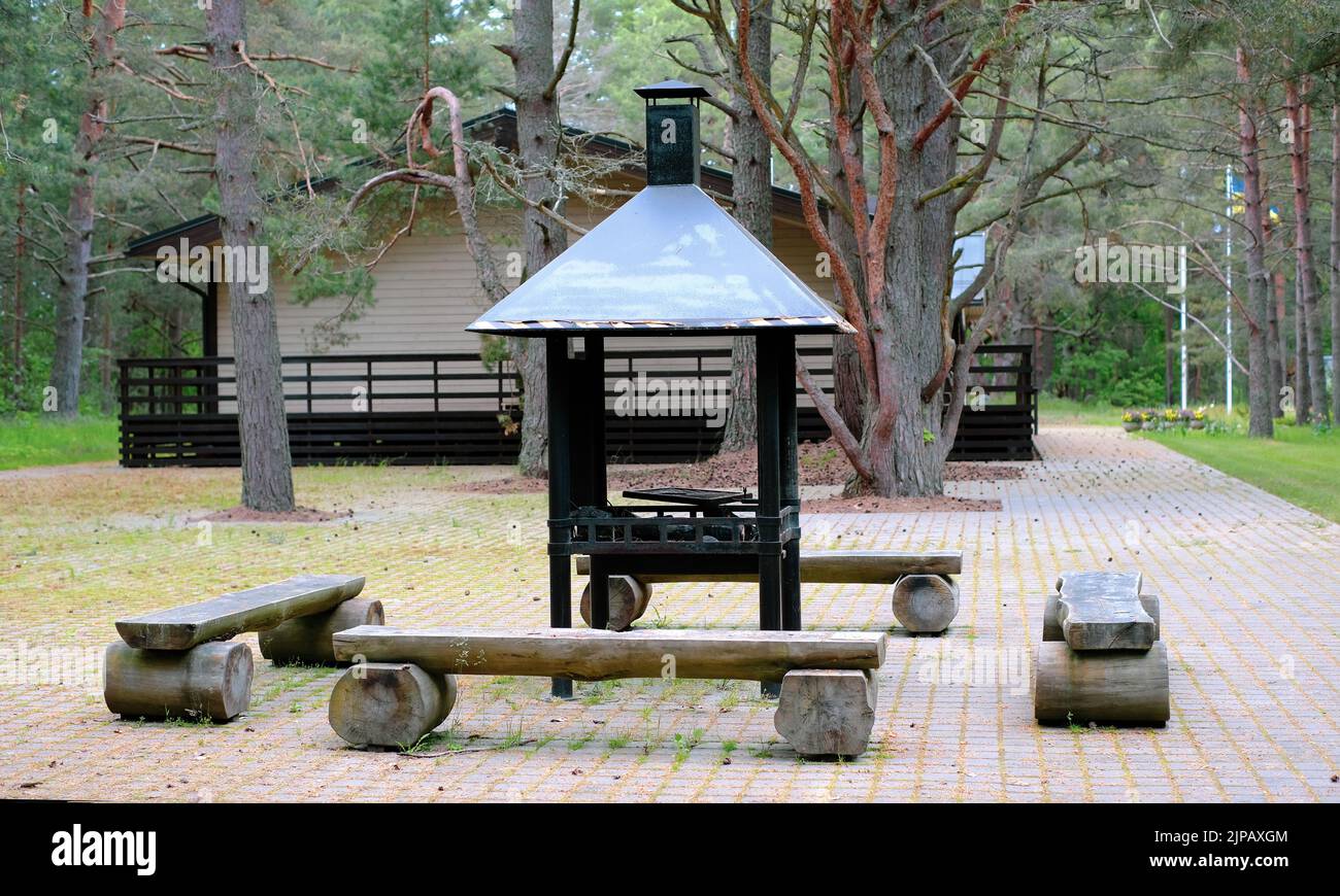 Barbecue with a roof for barbecue in the forest park area Stock Photo ...