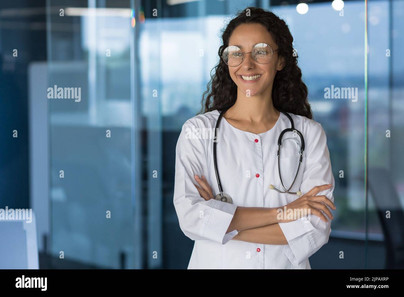 Portrait of a beautiful Latin American female doctor, doctor in working ...