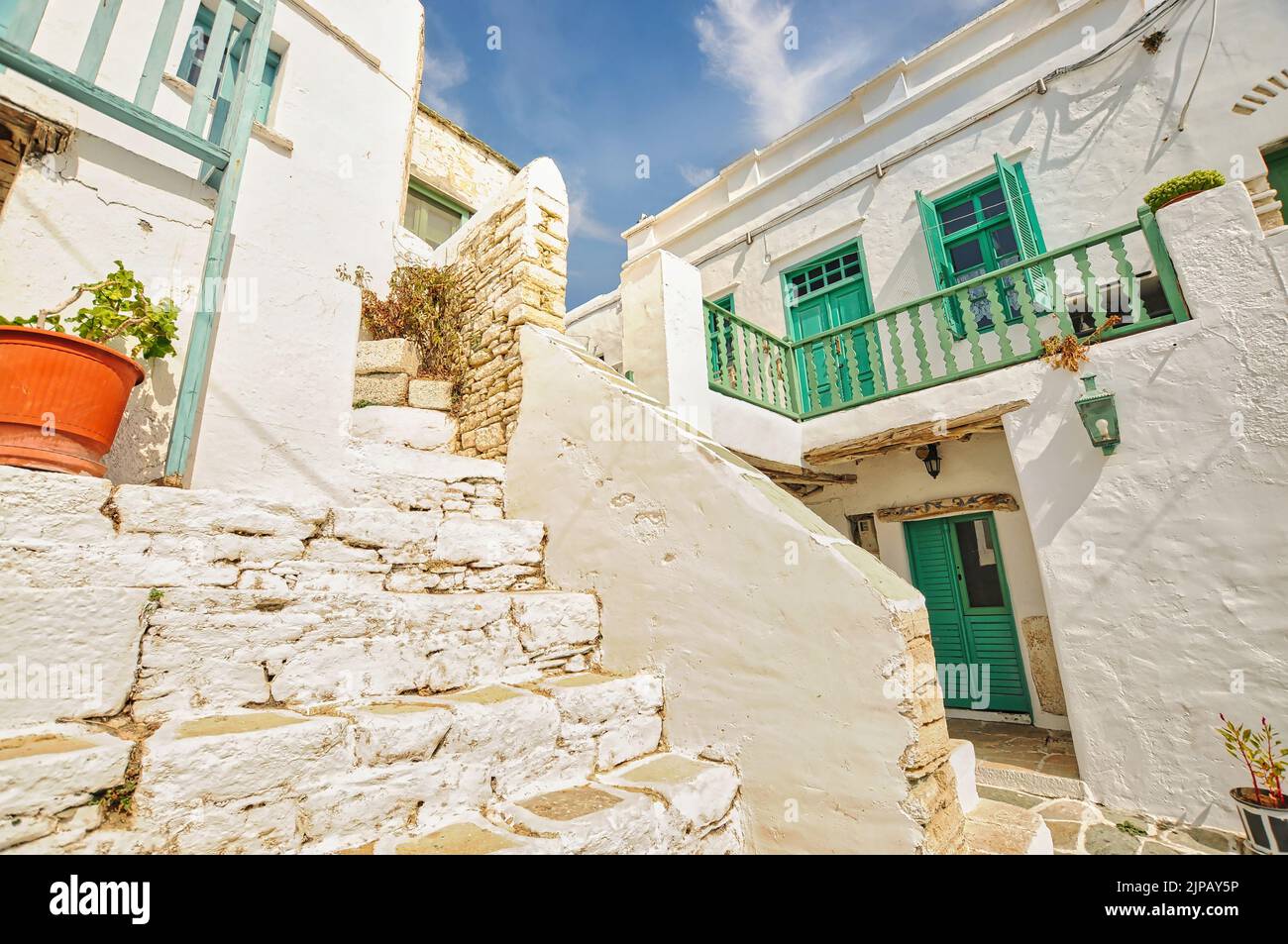 A view of a white building in Castro, the oldest part of the Chora town ...