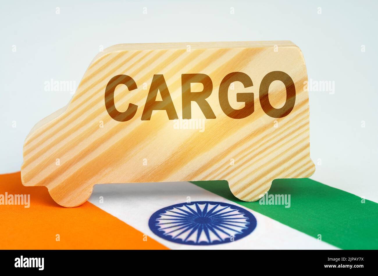 The concept of cargo transportation and logistics. On the flag of India ...