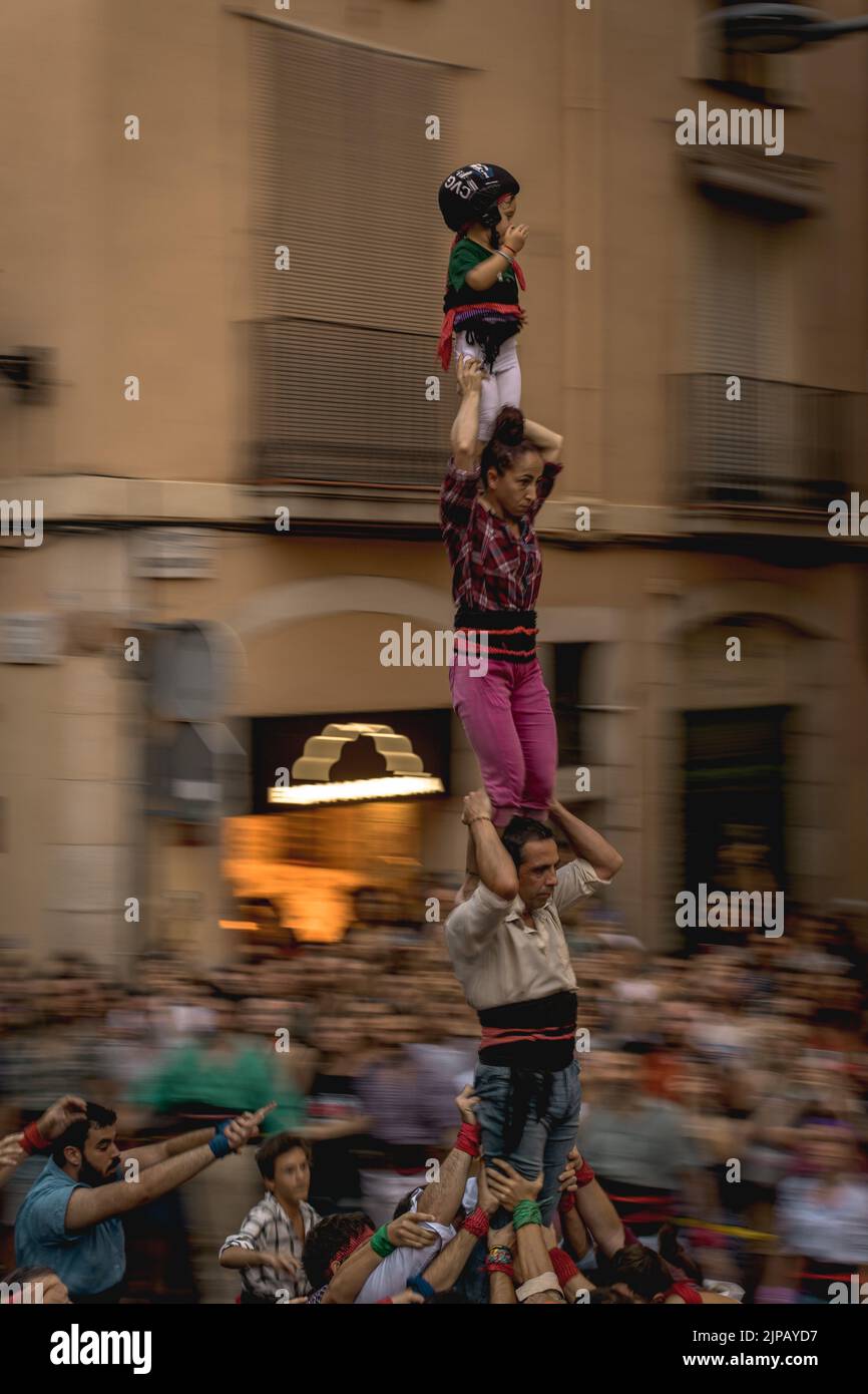 Barcelona, Spain. 16th Aug, 2022. The 'Castellers de Gracia' build a ...