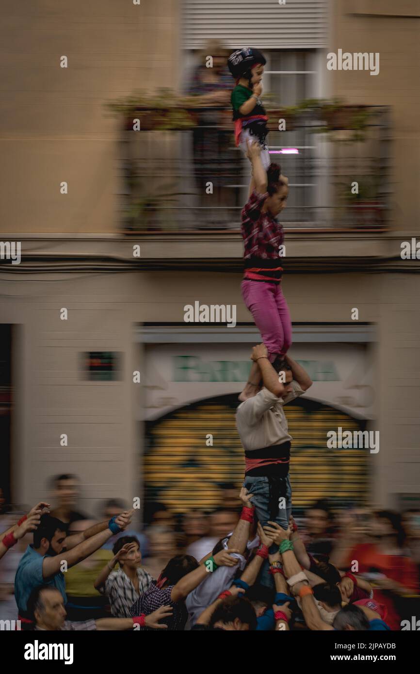 Barcelona, Spain. 16th Aug, 2022. The 'Castellers de Gracia' build a ...