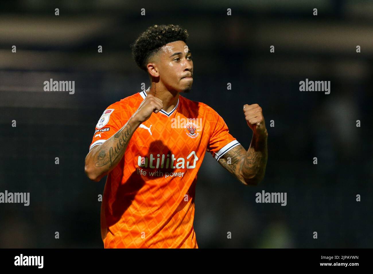 Jordan Lawrence-Gabriel #4 of Blackpool celebrates the win at the final ...