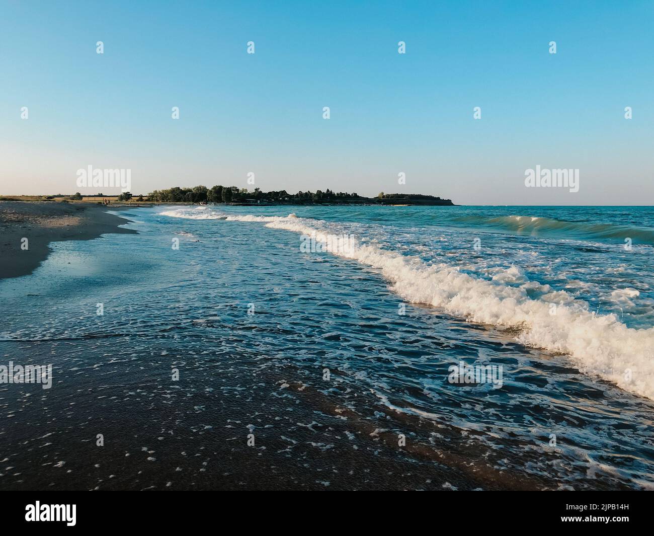 Sea blue aquamarine waves line sunny sand beach. Soft wave of ocean ...