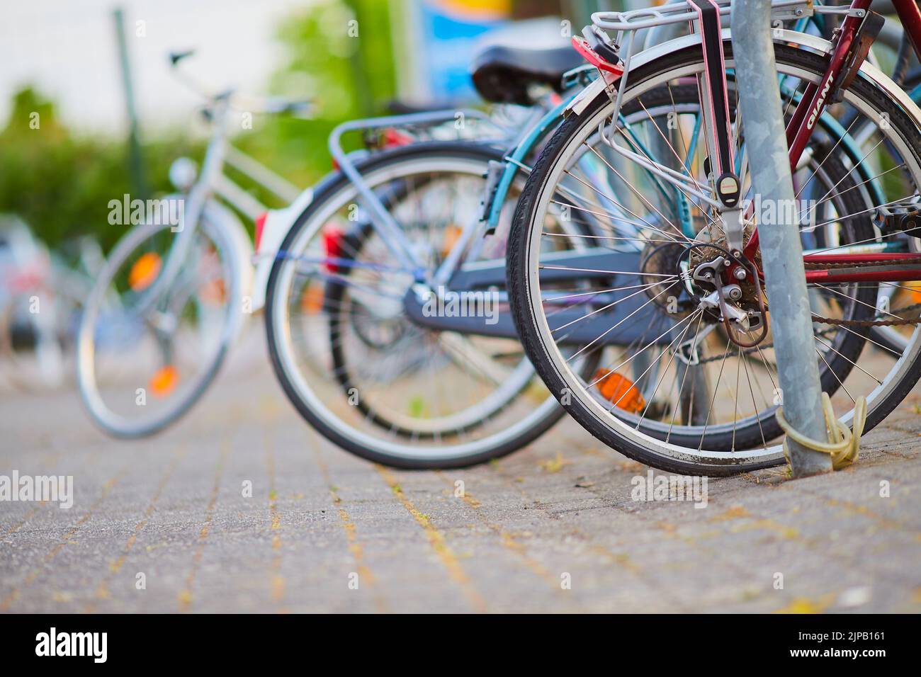 Bikes at bicycle parking hi-res stock photography and images - Alamy