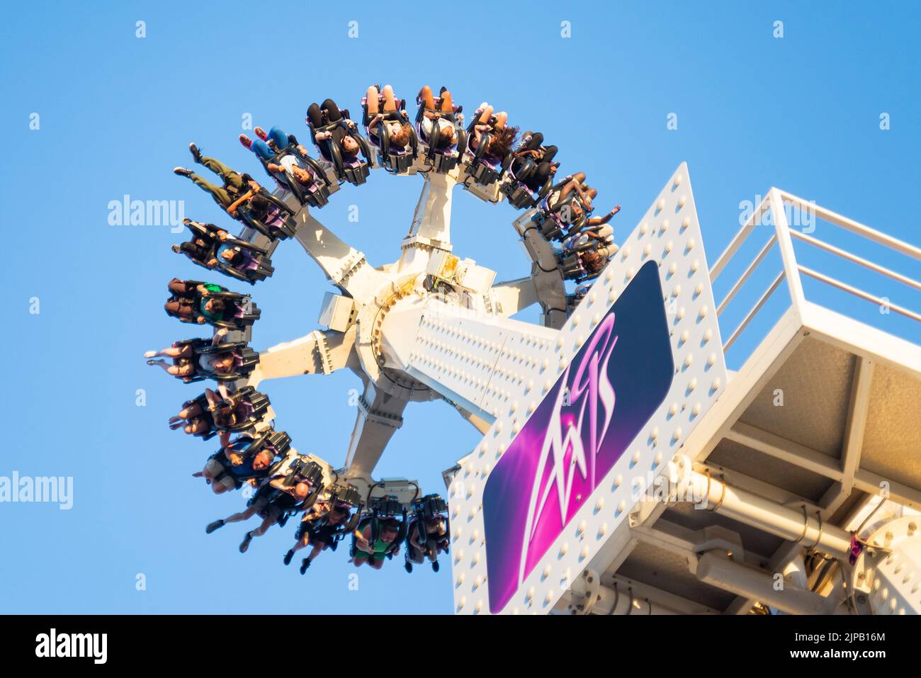Young thrill-seekers on the Axis ride in Adventure Island on a hot ...