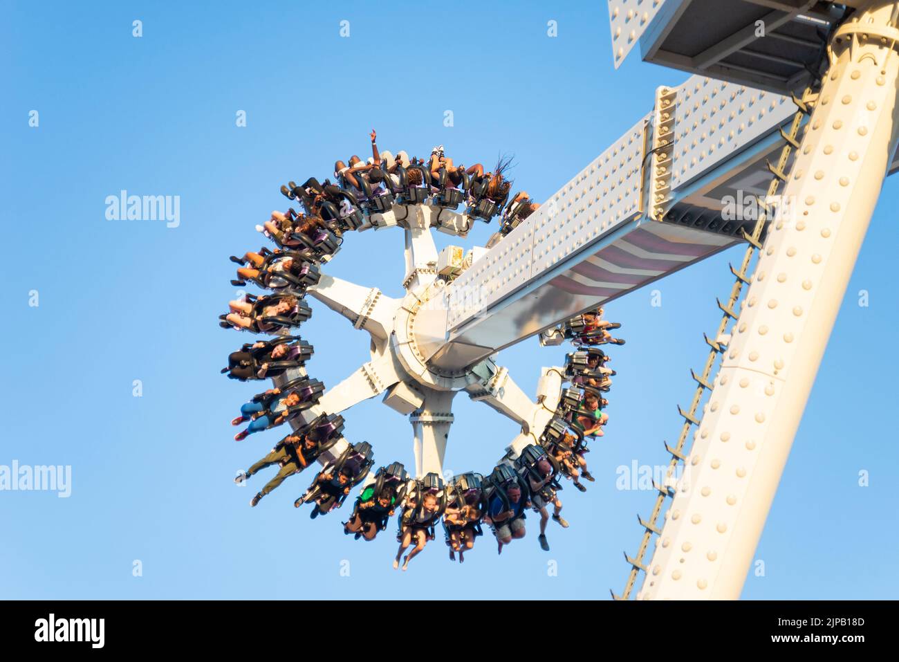 Young thrill-seekers on the Axis ride in Adventure Island on a hot ...