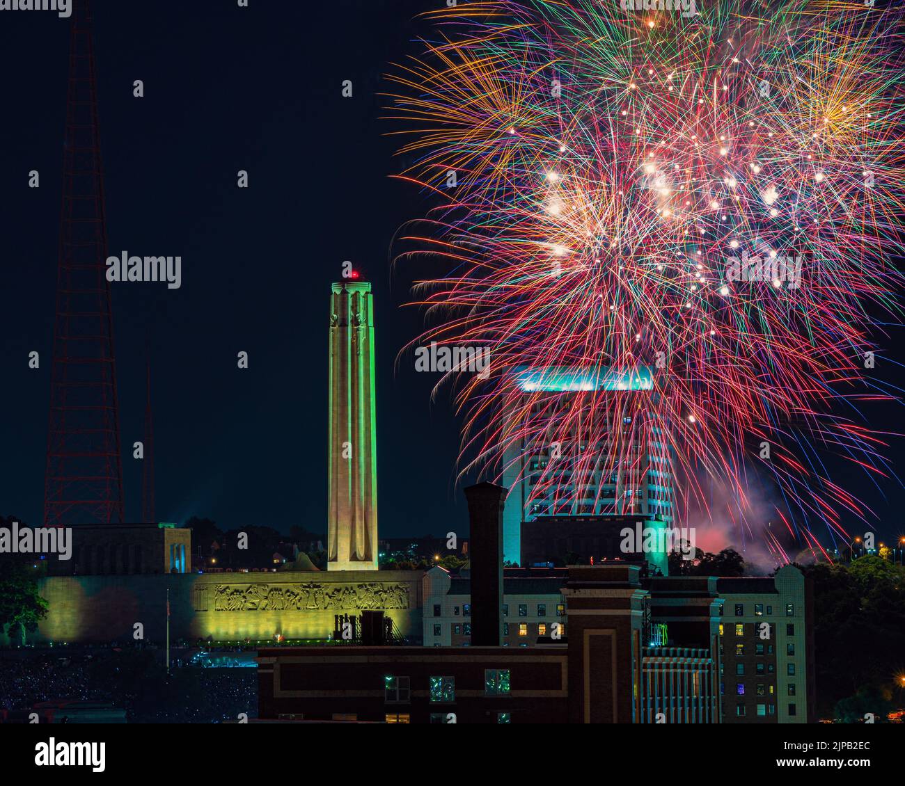 A bright show of exploding fireworks over Liberty Memorial in Kansas ...