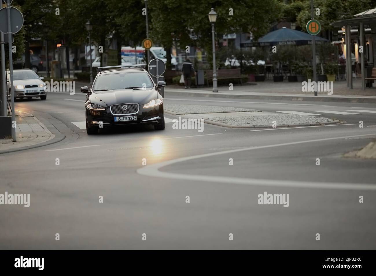 A busy road with cars riding through an intersection in Geilenkirchen ...
