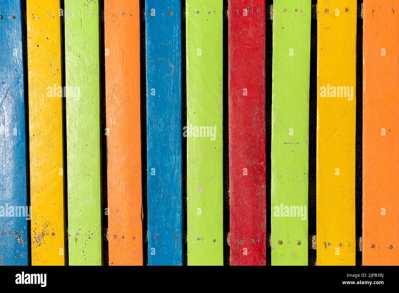 Colorful wooden boardwalk. Wooden boards. Empty space, for text or logo ...