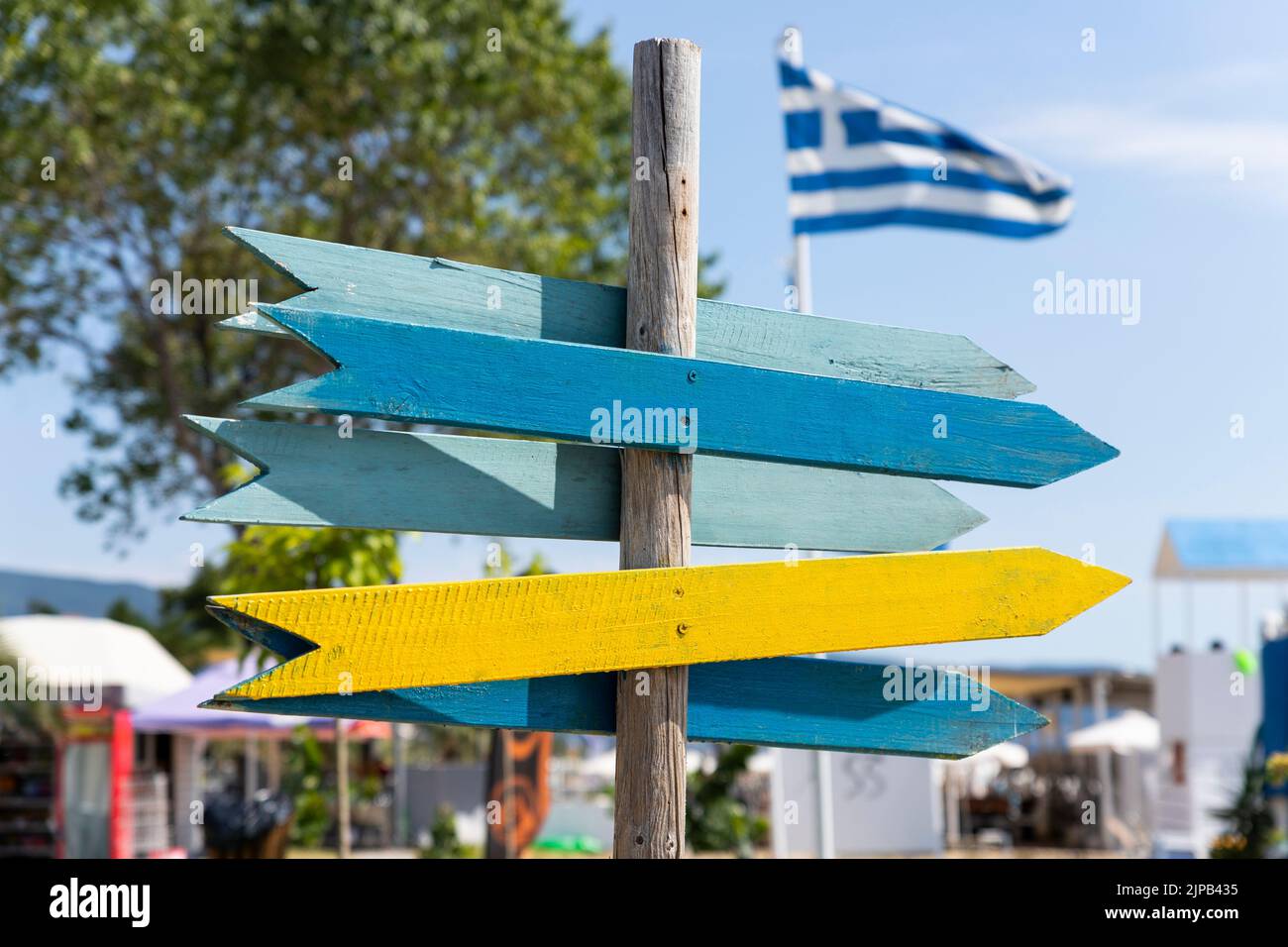 Wooden arrow sign post. Empty boards for your text. Copy space, add ...