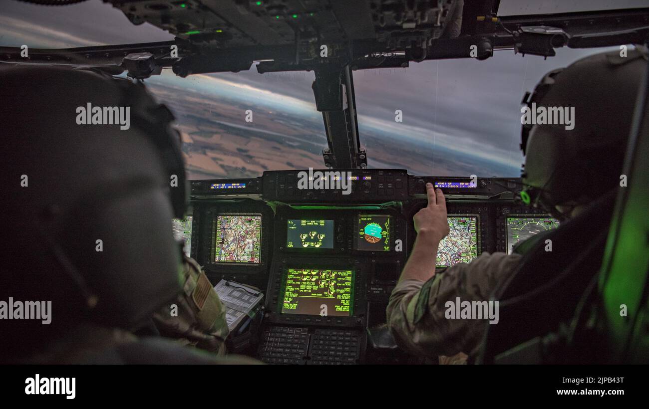 U.S. Air Force pilots and an Air Force flight engineer, all assigned to ...