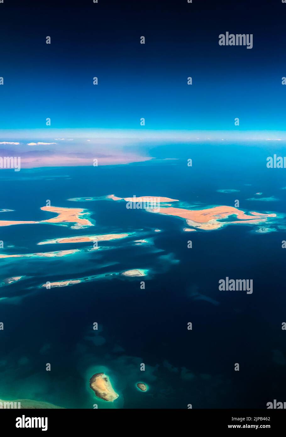 Aerial top view from airplane coastline Egyptian Desert islands. Red ...