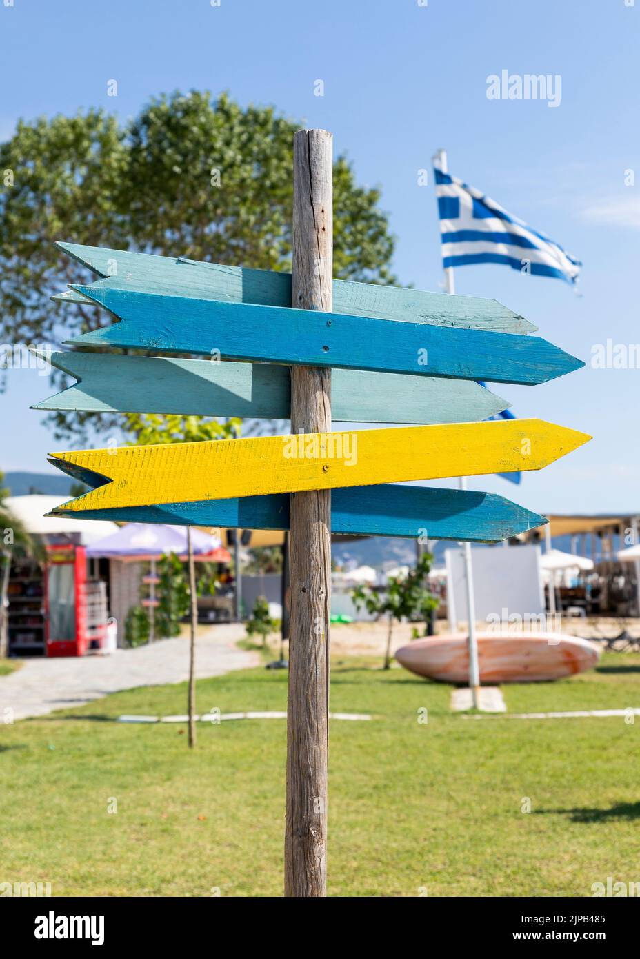 Wooden arrow sign post. Empty boards for your text. Copy space, add ...