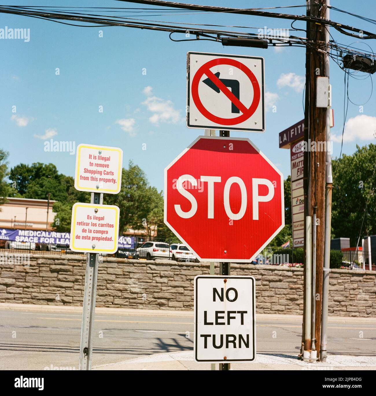 Stop Sign And No Left Turn Sign Stock Photo - Alamy
