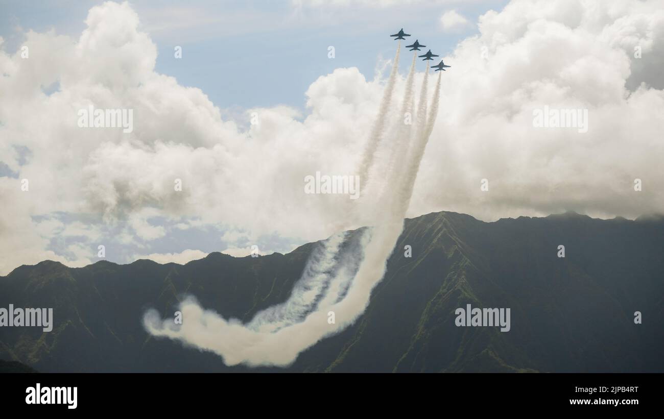 U.S. Navy Blue Angel F/A-18 Super Hornets perform aerial stunts at the ...