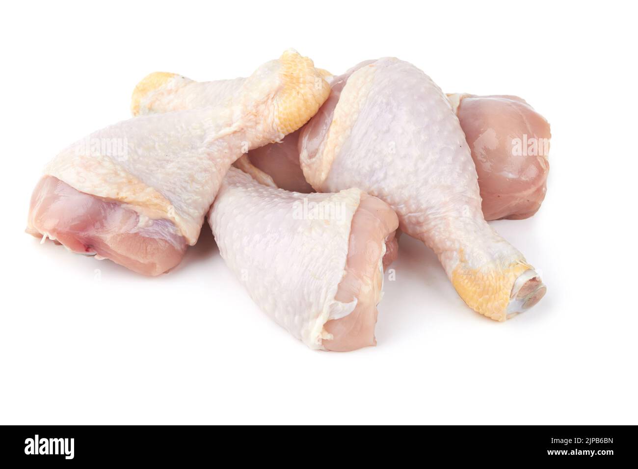 Chicken legs isolated on a white background Stock Photo - Alamy