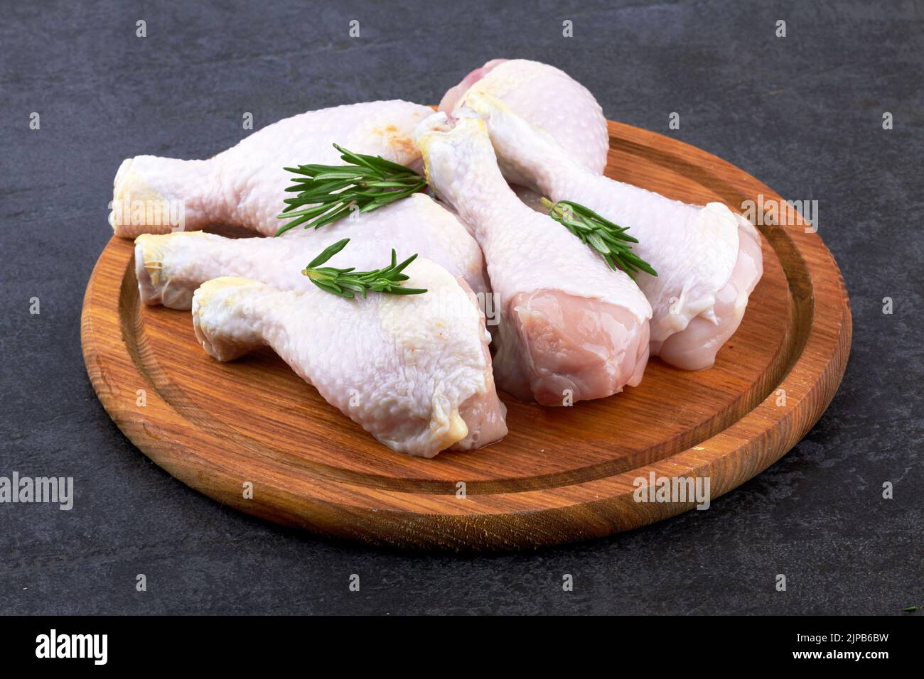Salt on cooking chicken legs hi-res stock photography and images - Alamy