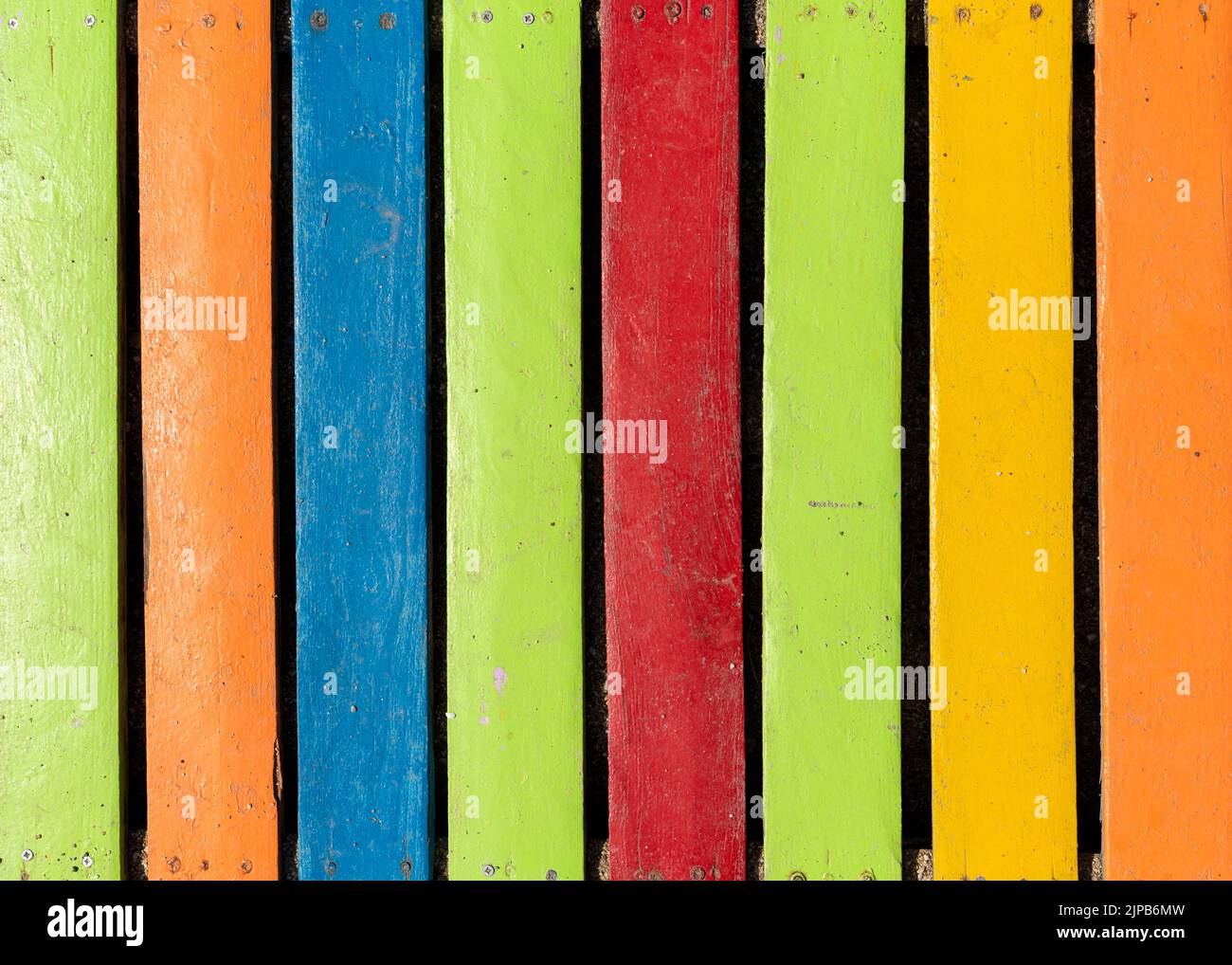 Colorful wooden boardwalk. Wooden boards. Empty space, for text or logo ...