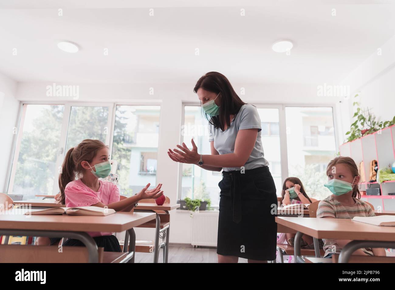 Preschool education. Students at school play interesting games with the ...
