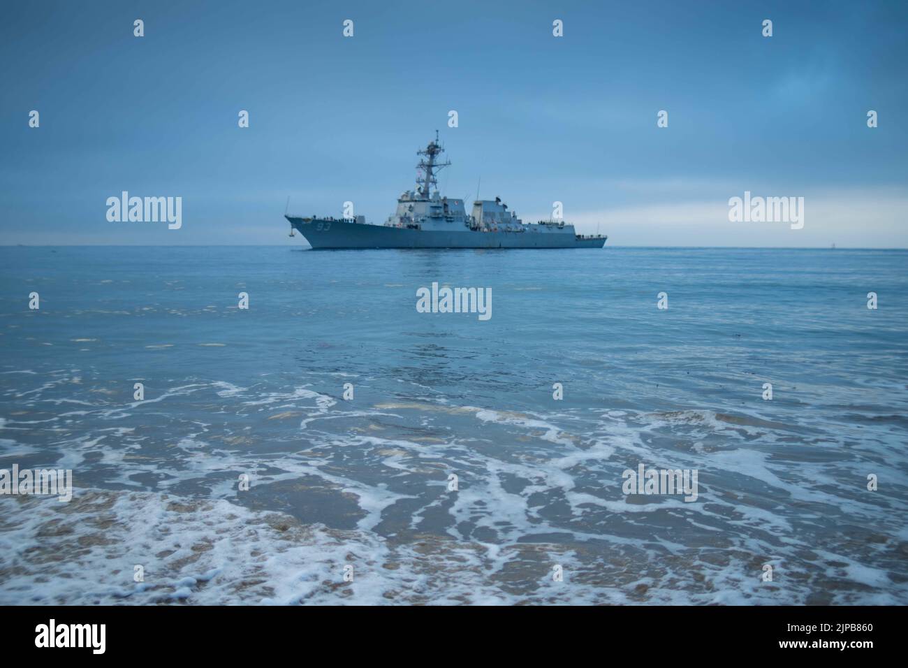 Port Hueneme, California, USA. 22nd June, 2022. As waves lap the shore ...