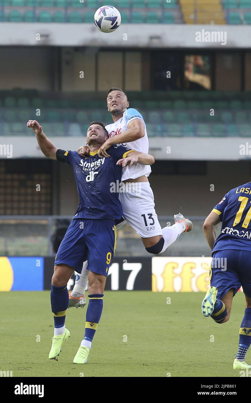 Amir Rrahmani of SSC Napoli competes for the ball with Thomas Henry of ...
