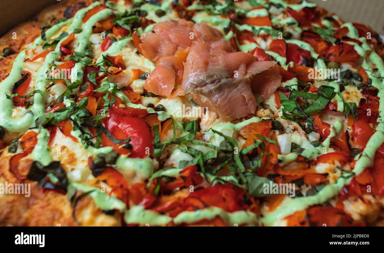 Smoked salmon pizza. Traditional Italian pizza with smoked salmon on ...