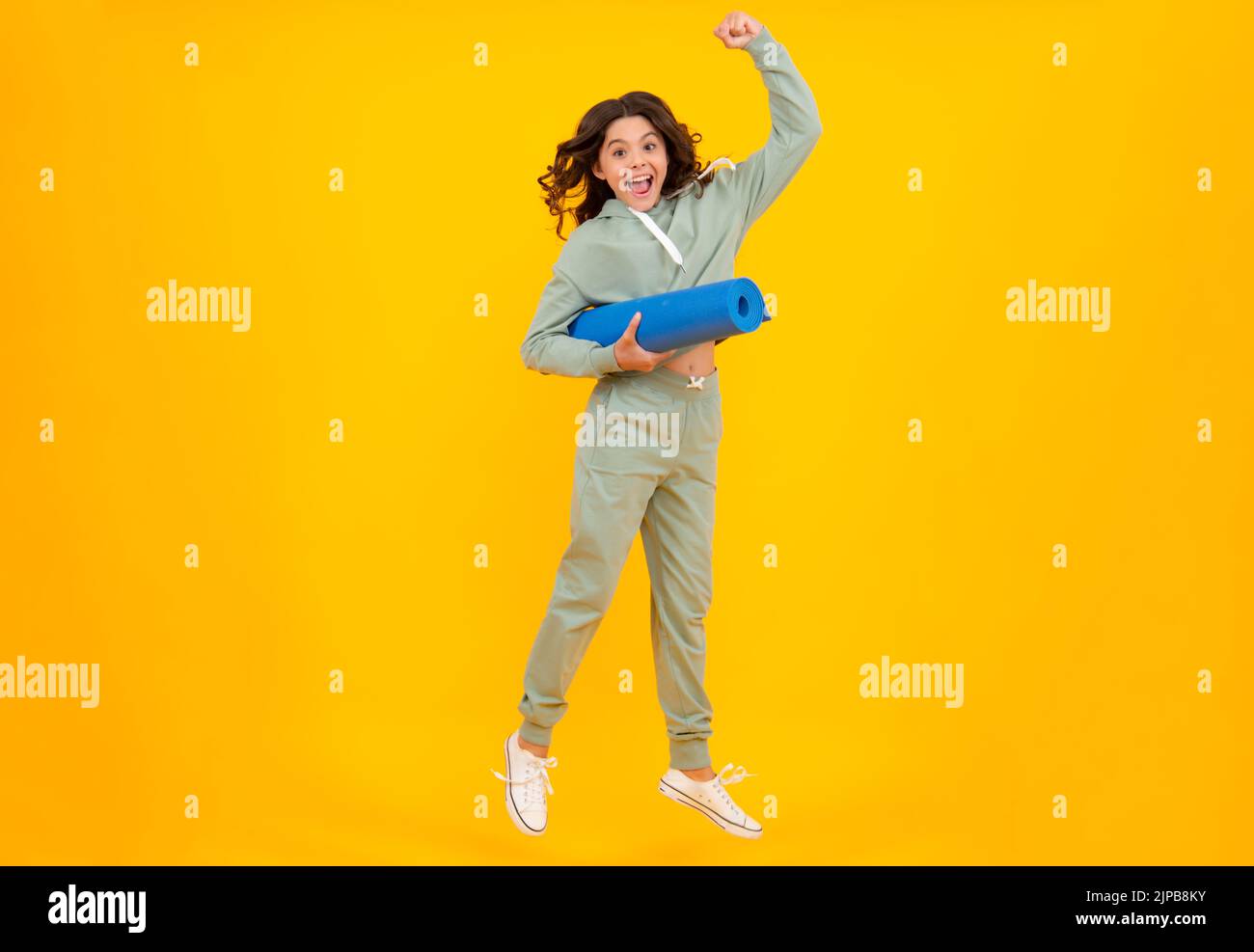 Teen girl dressed in sports uniform. Teenager in a posh stylish sports ...