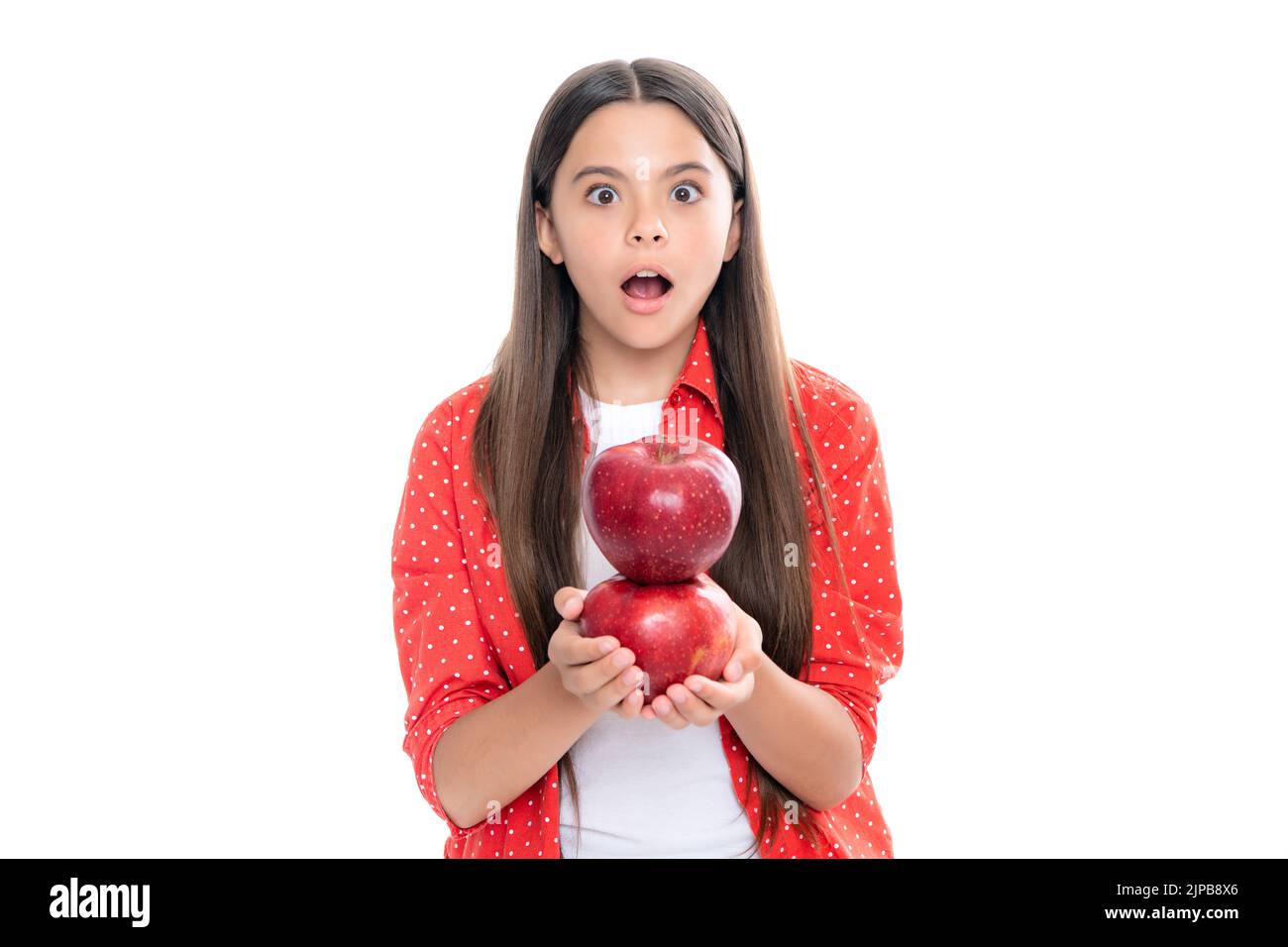 Cute girl biting red apple hi-res stock photography and images - Alamy