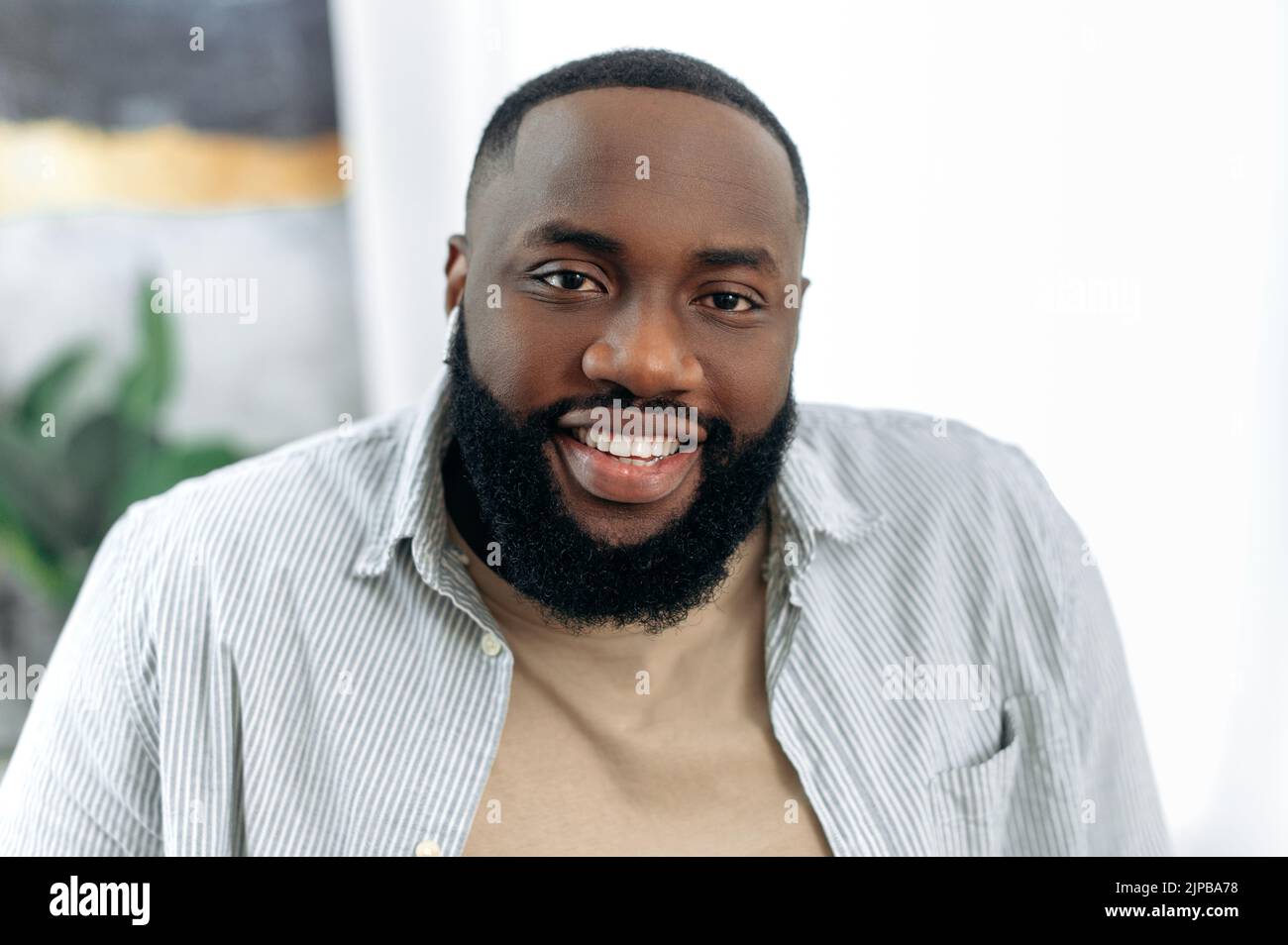 Confident smiling male model hi-res stock photography and images - Alamy