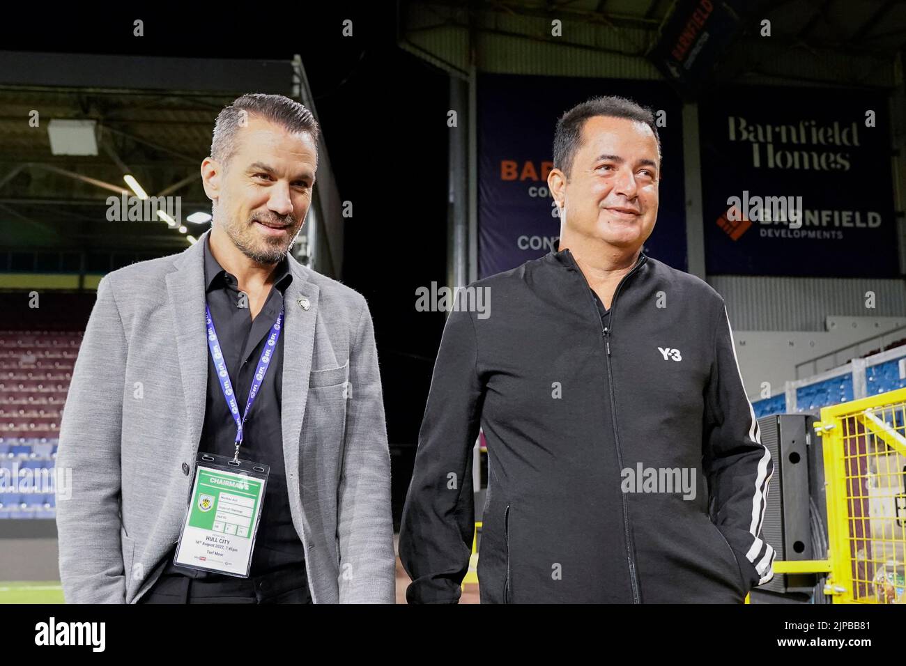 Merthan Acil and Hull City owner Acun Ilicali leave the stadium after ...